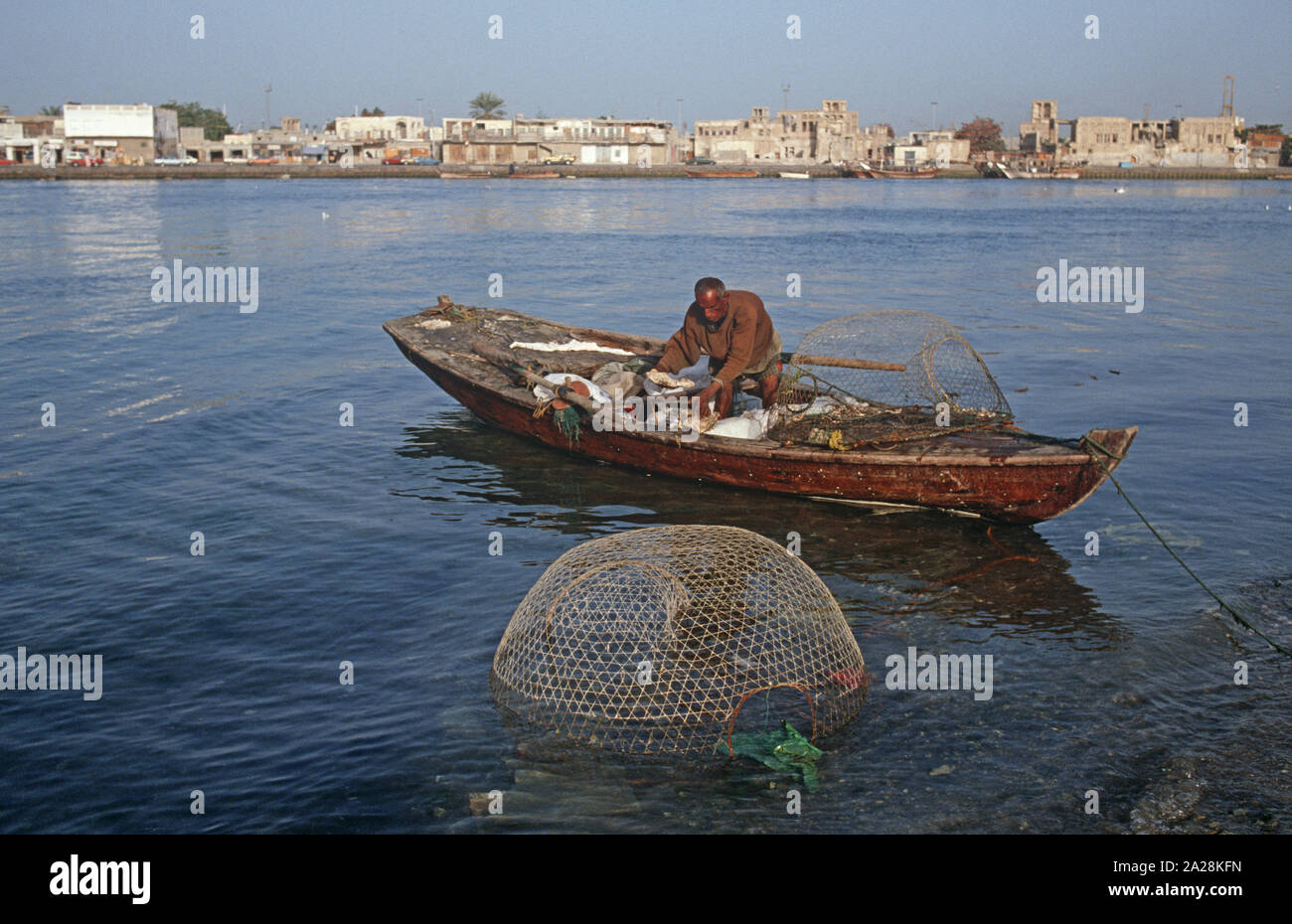 Dubai Creek fisherman, Dubai, United Arab Emirates, UAE Stock Photo - Alamy