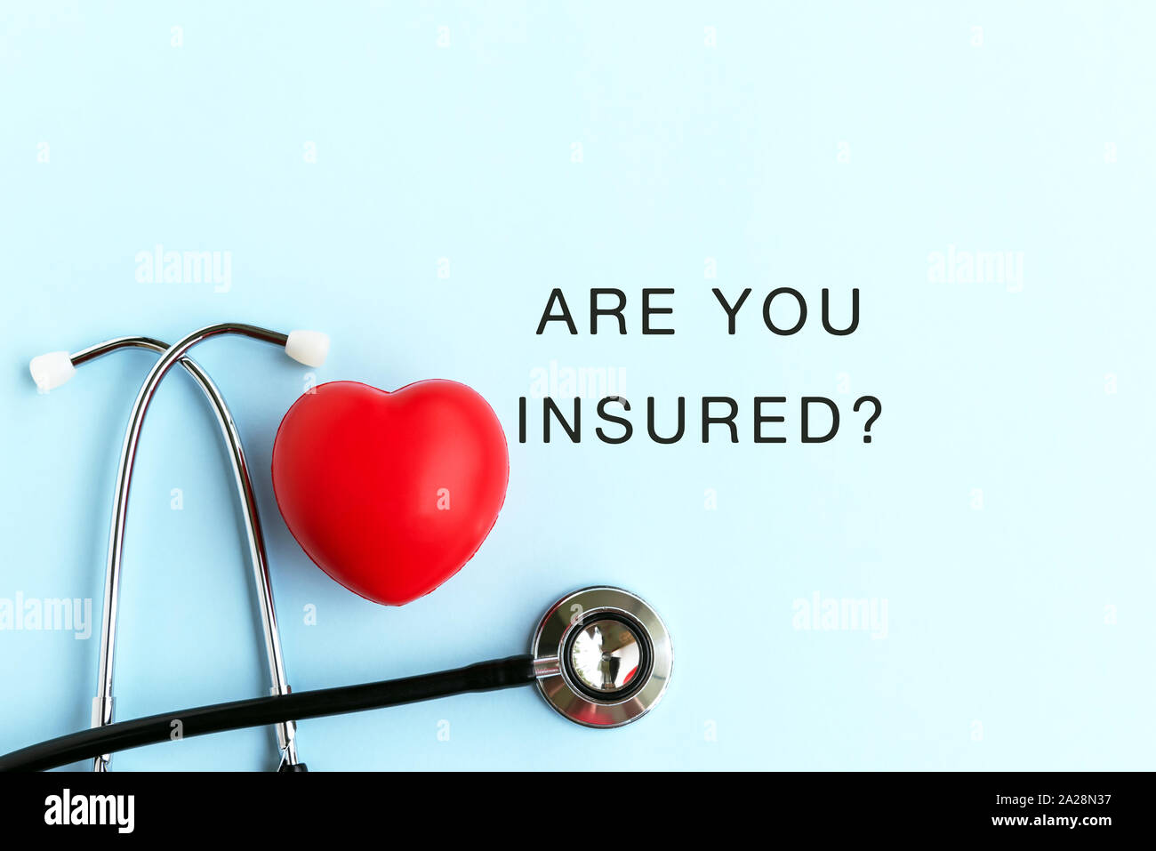 Are you insured? text with stethoscope and heart shape Stock Photo - Alamy