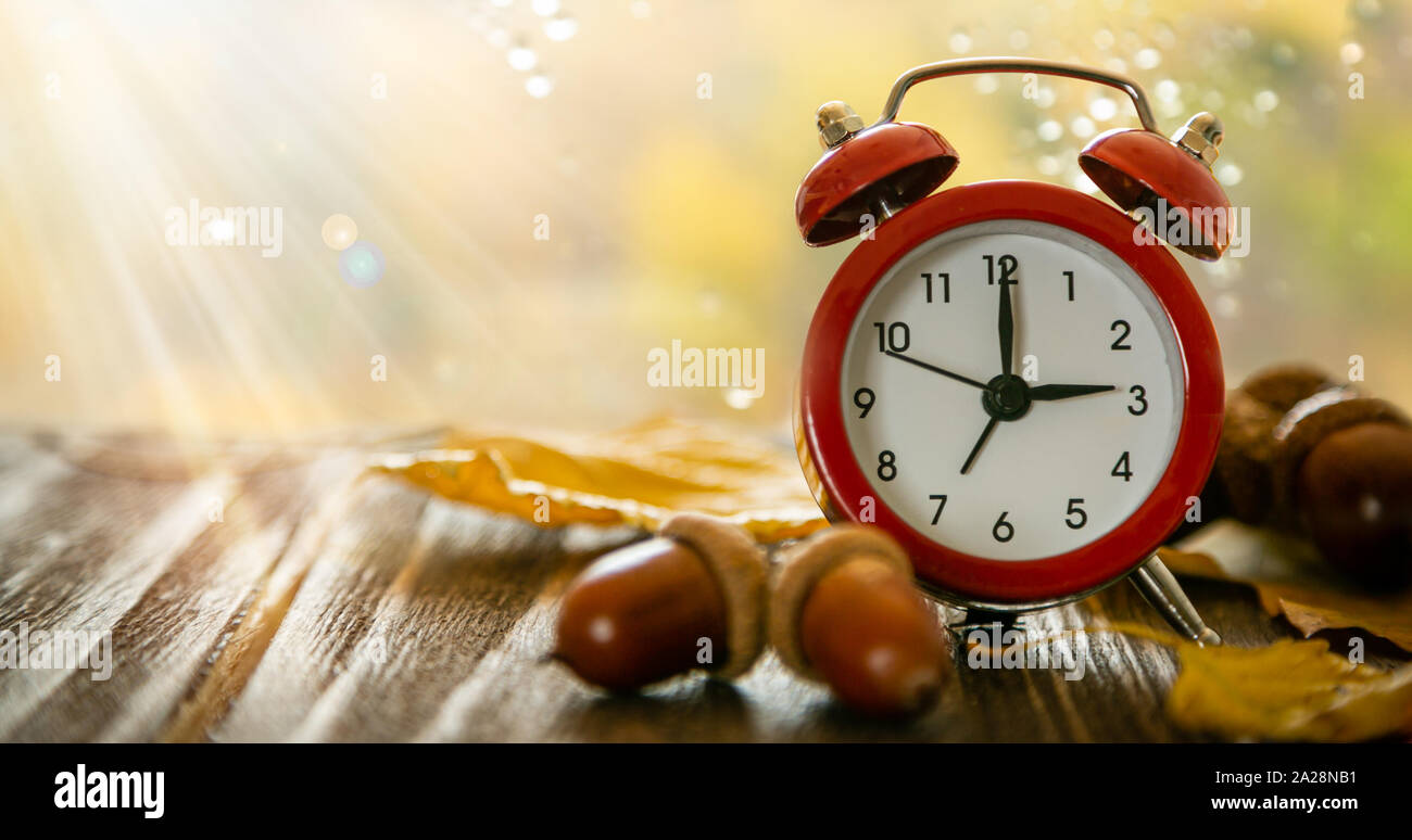 Alarm clock with wood background hi-res stock photography and images ...