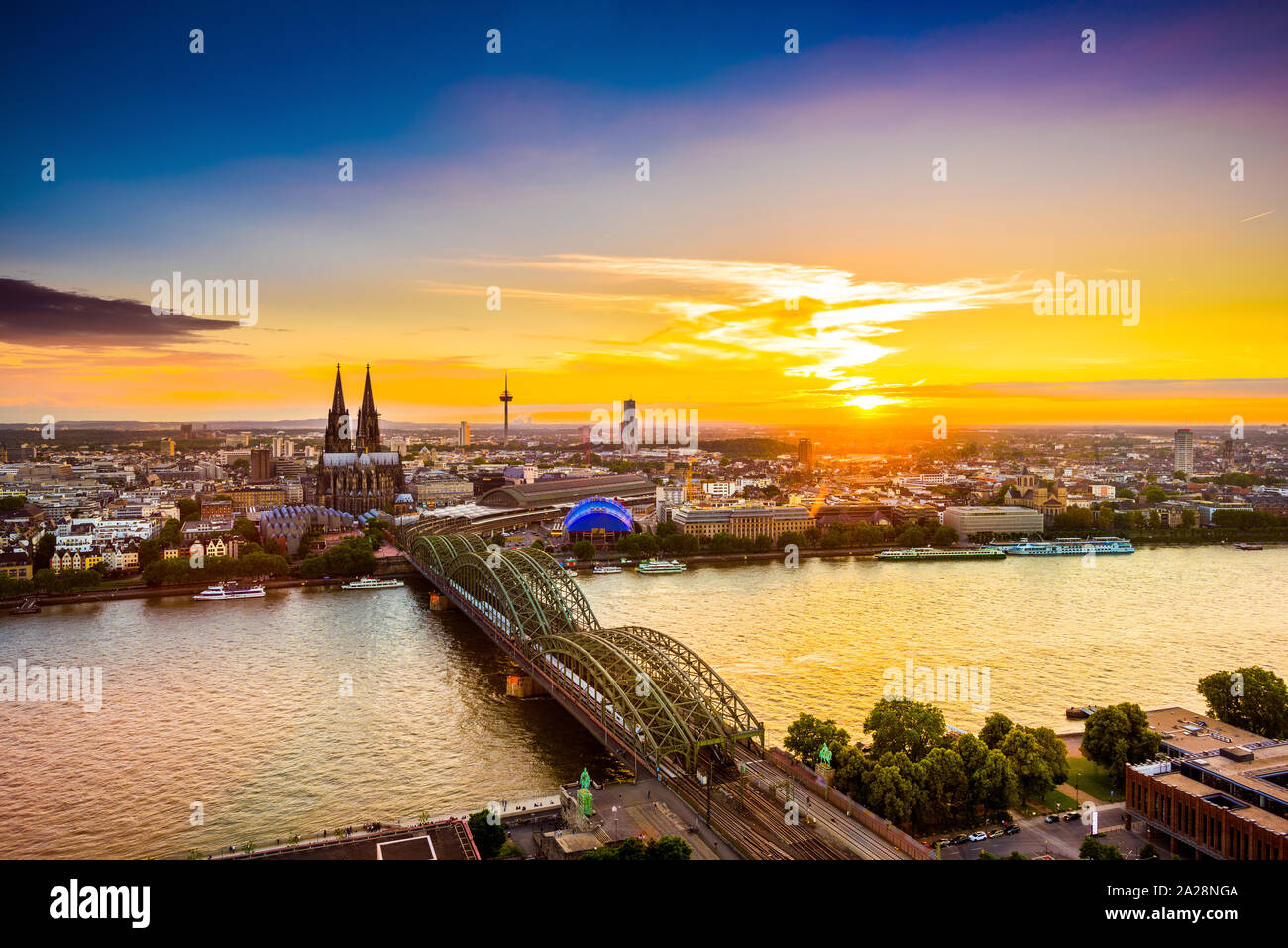 Cologne Cathedral at sunset, skyline of Cologne, Germany Stock Photo ...