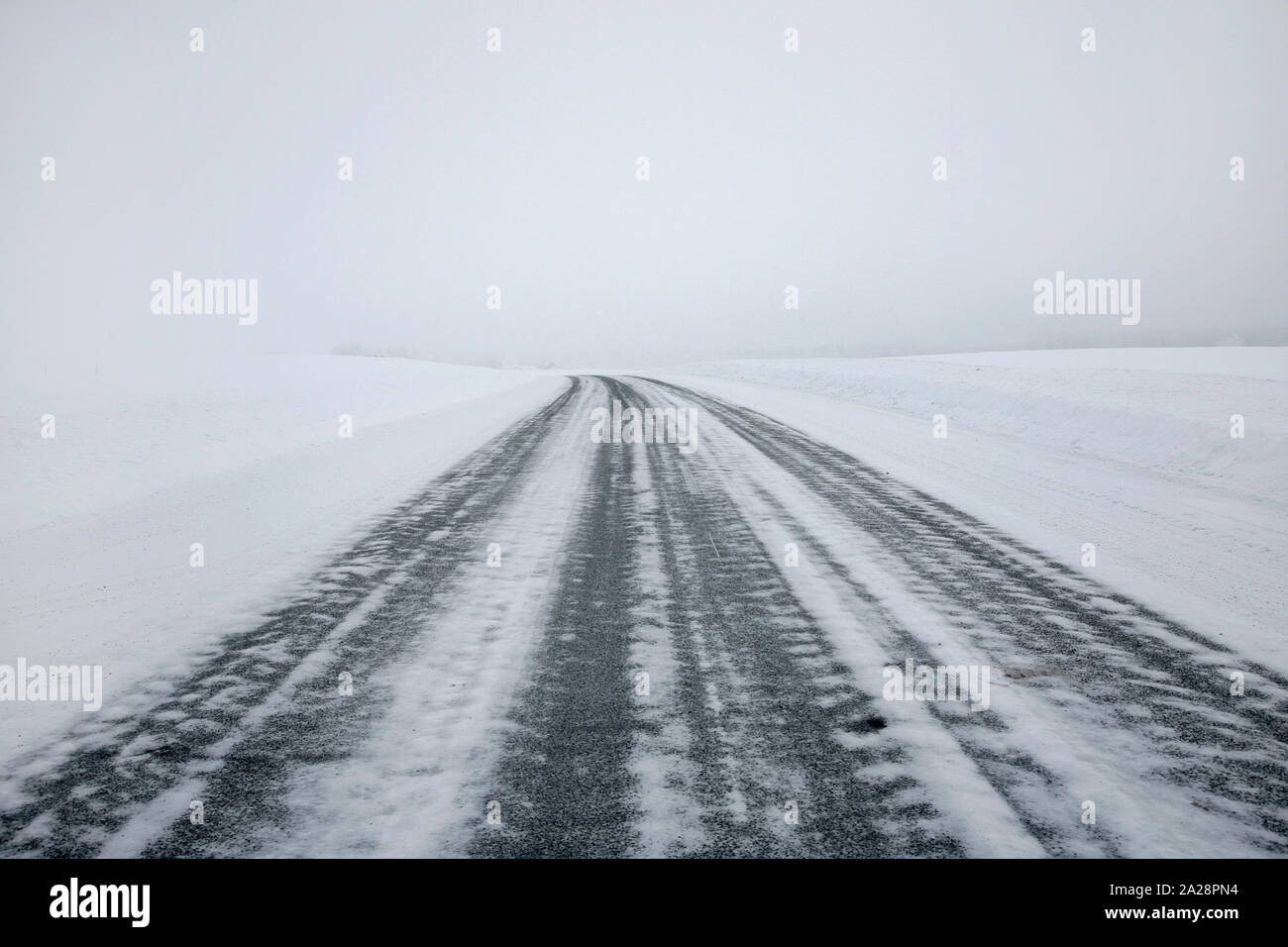 Empty slippery icy misty road in Europe in gloomy winter Stock Photo ...
