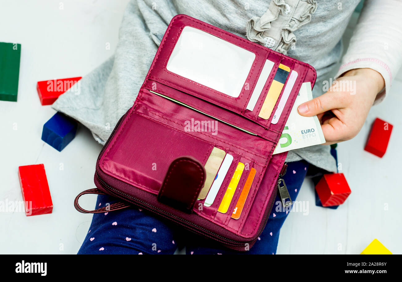 Person holding wallet with euros hi-res stock photography and images ...