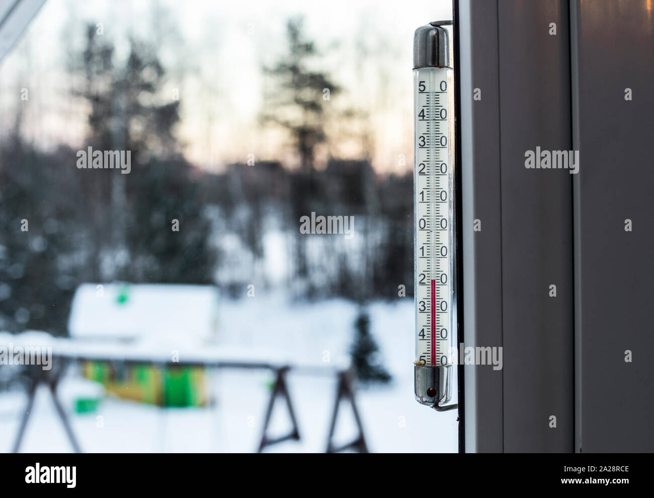 Cold wave in Europe in winter. Old style outdoor thermometer showing ...