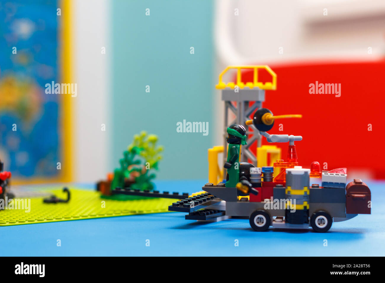 Colorful lego blocks on the blue table Stock Photo - Alamy