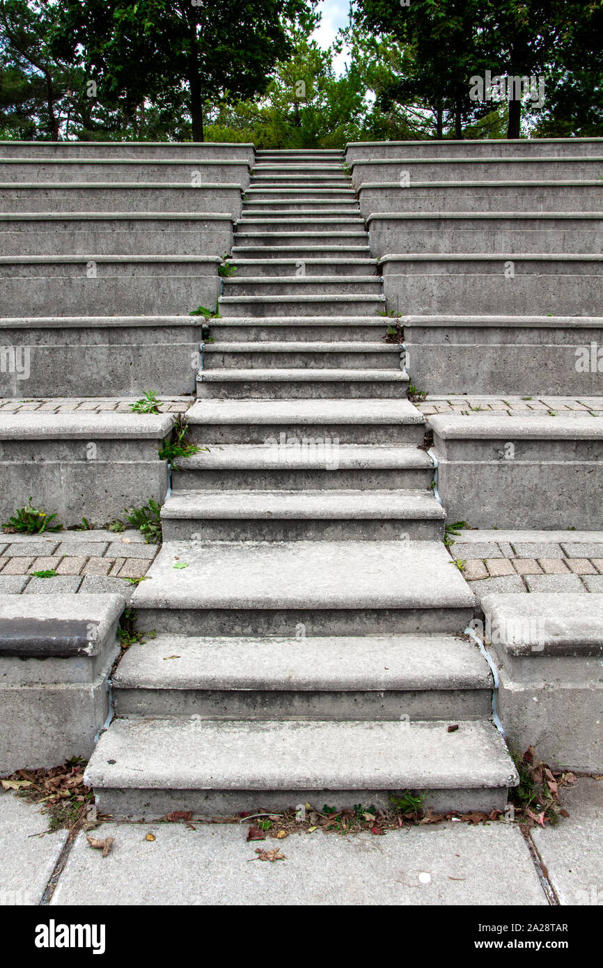 cement set of stairs with sitting area Stock Photo - Alamy