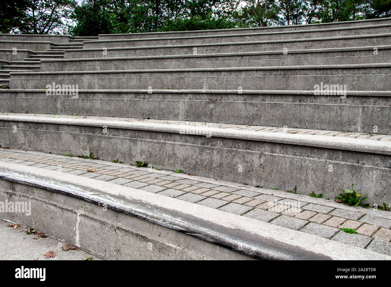 cement set of stairs with sitting area Stock Photo - Alamy