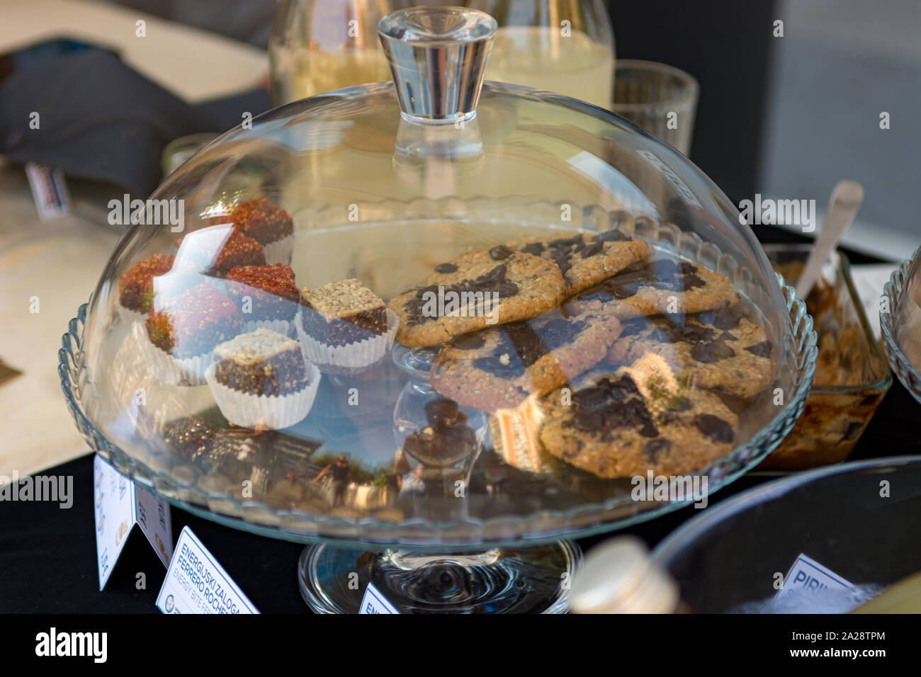 Delicious deserts served at outdoor market place Stock Photo - Alamy