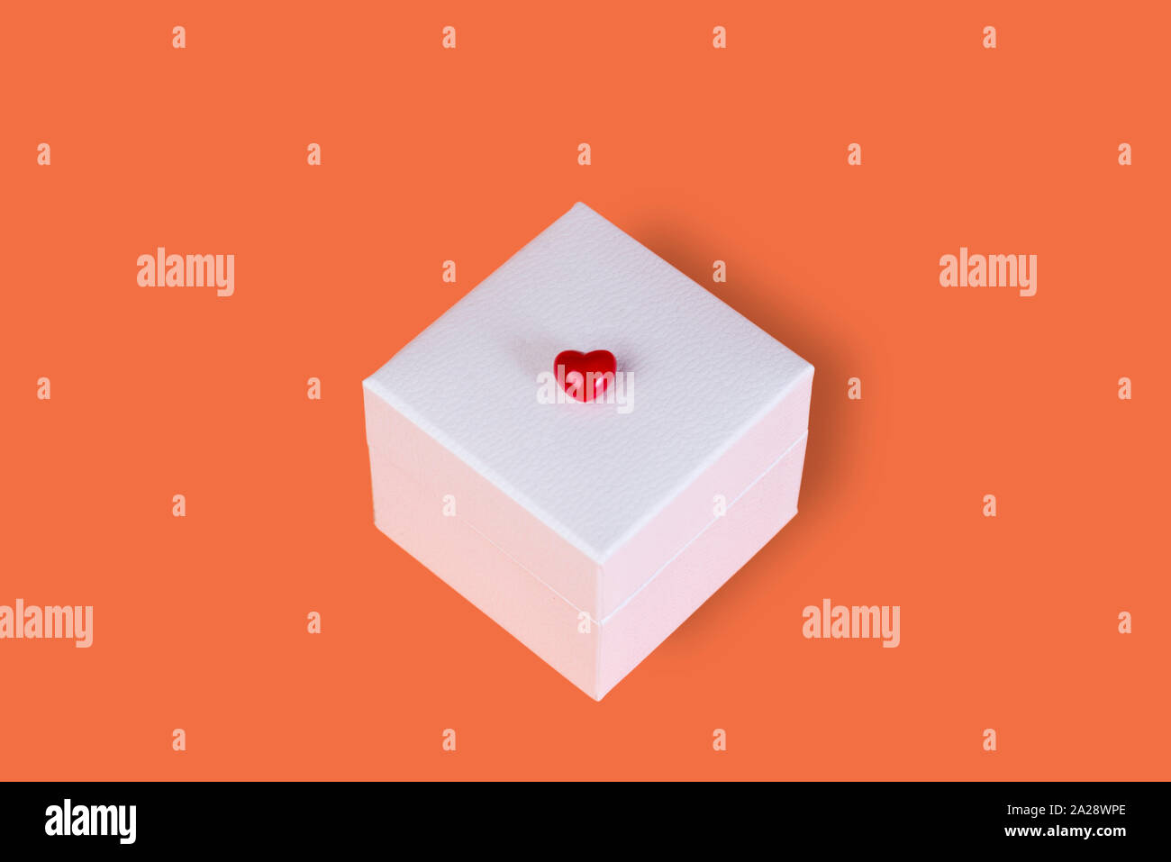 white square box on an orange background Stock Photo - Alamy