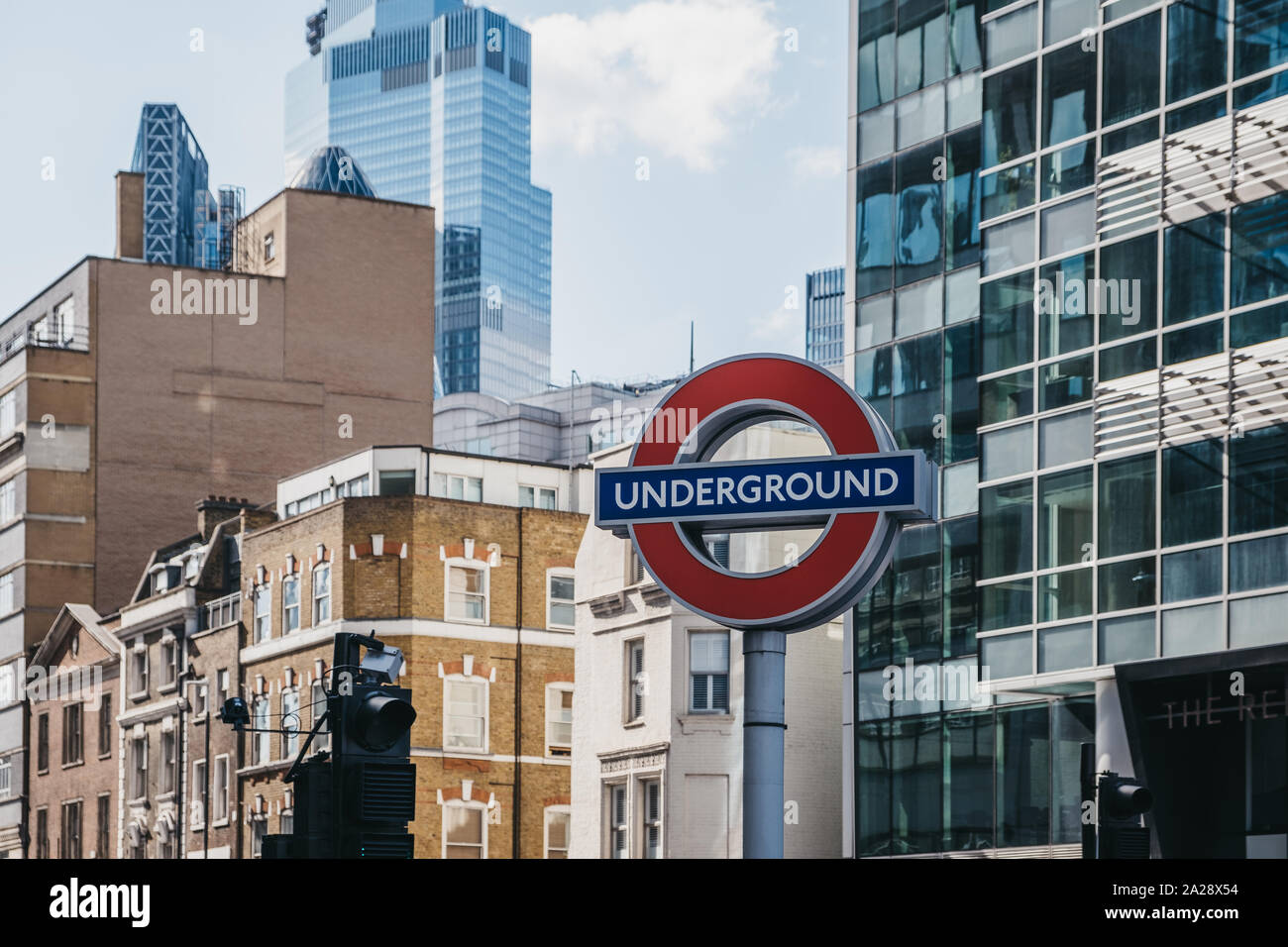 London, UK - September 07, 2019: London Underground sign against houses ...