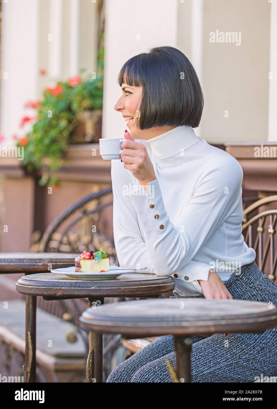 Gourmet concept. She loves sweets. Woman attractive elegant brunette ...