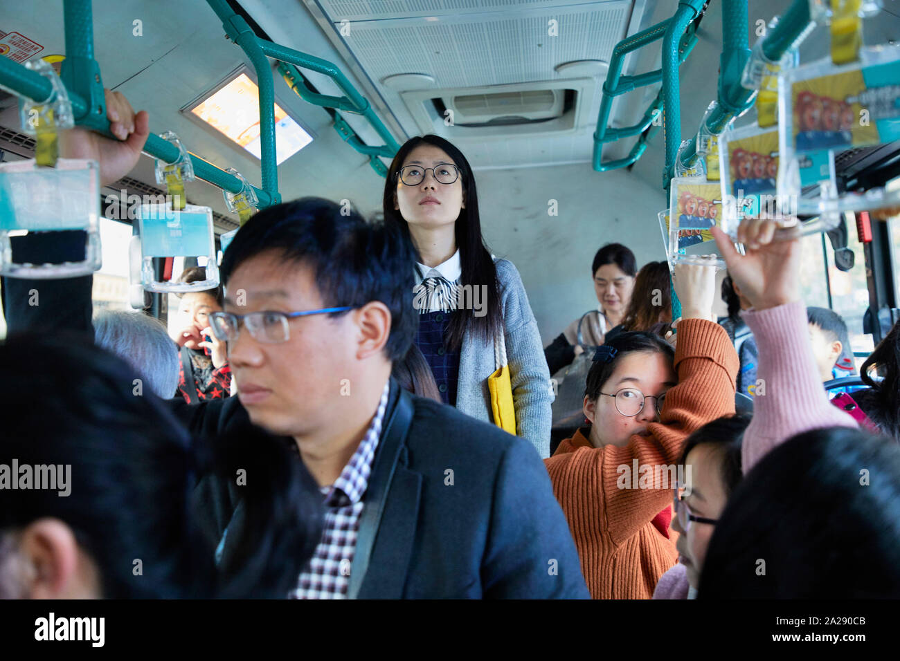 China Hangzhou. People using local transport the bus 11-11-2017 photo ...