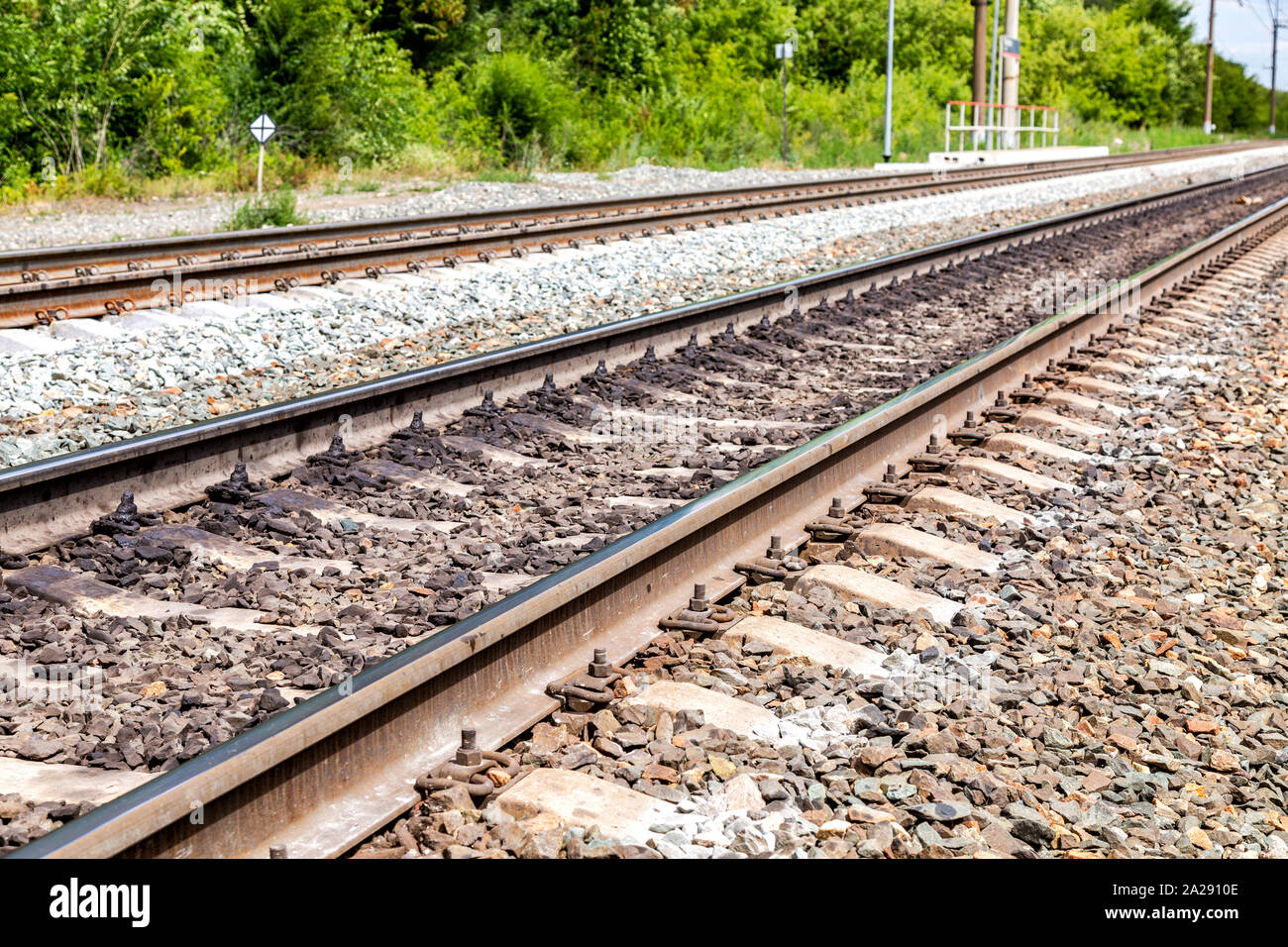 Double track railway crossing hi-res stock photography and images - Alamy