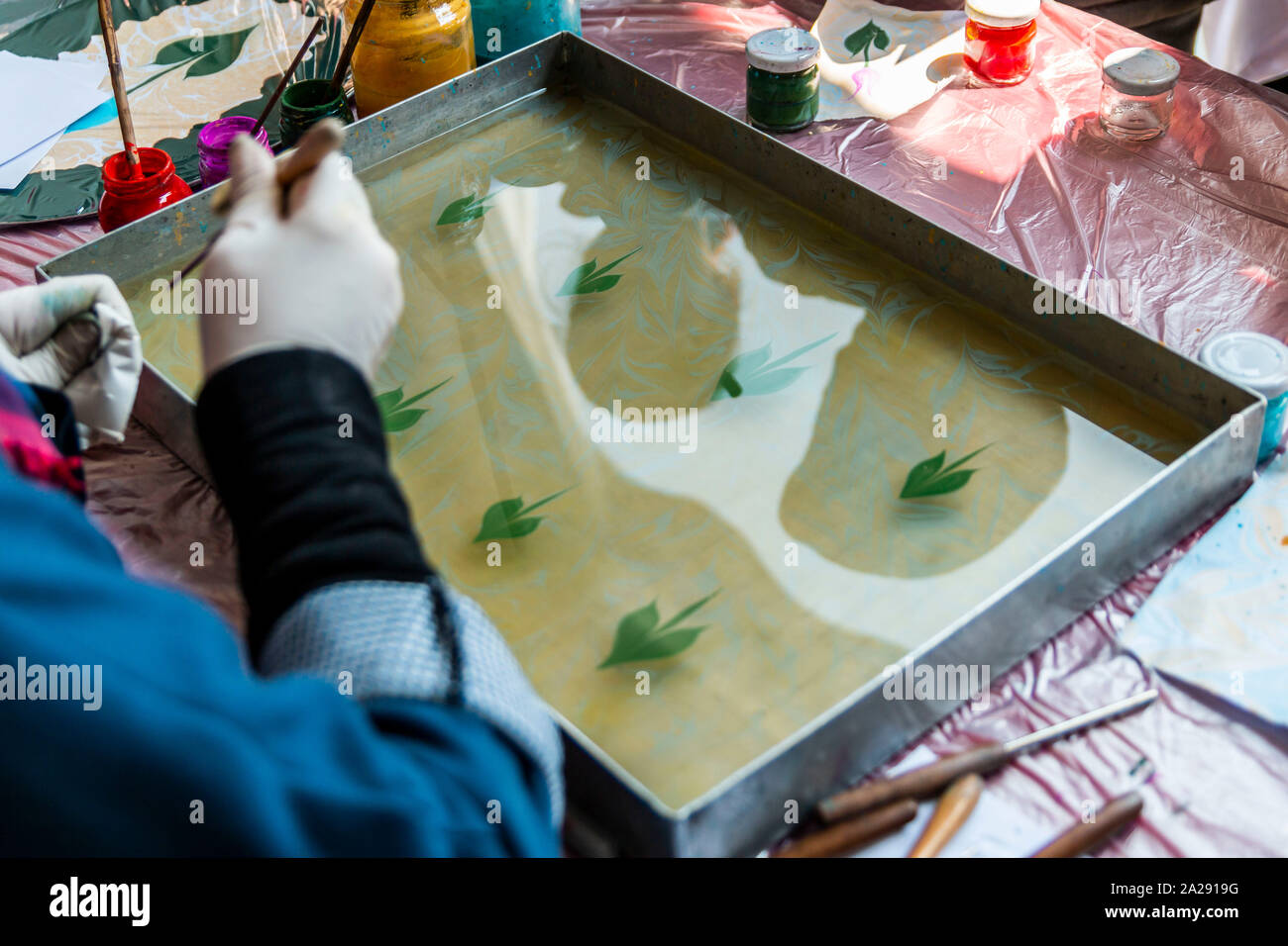 Ebru Art.The traditional art of painting on the water. Process of ...