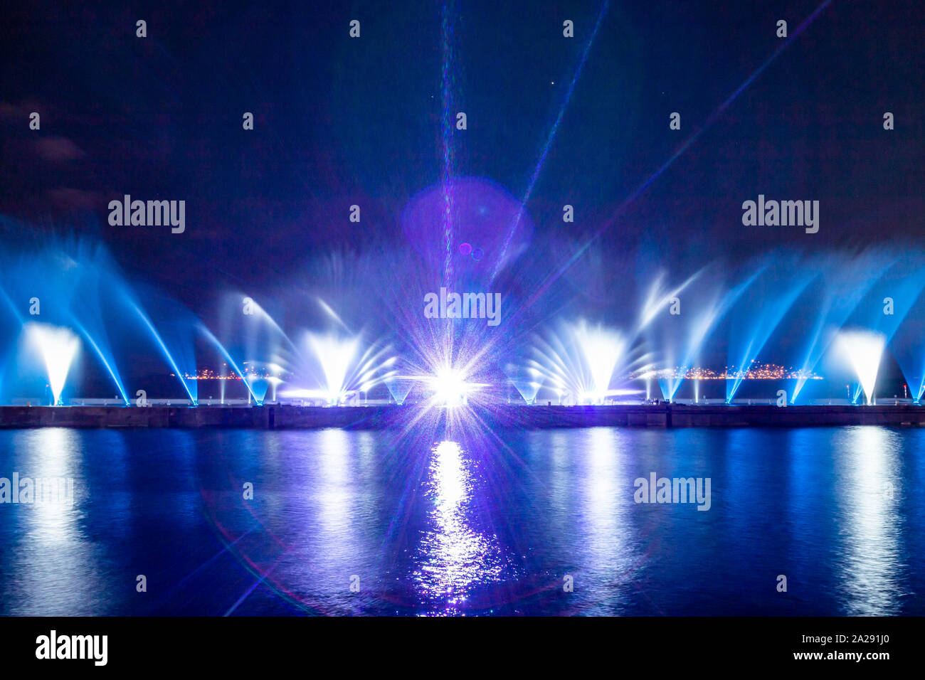 Laser show and water show on the beach of maltepe Stock Photo - Alamy