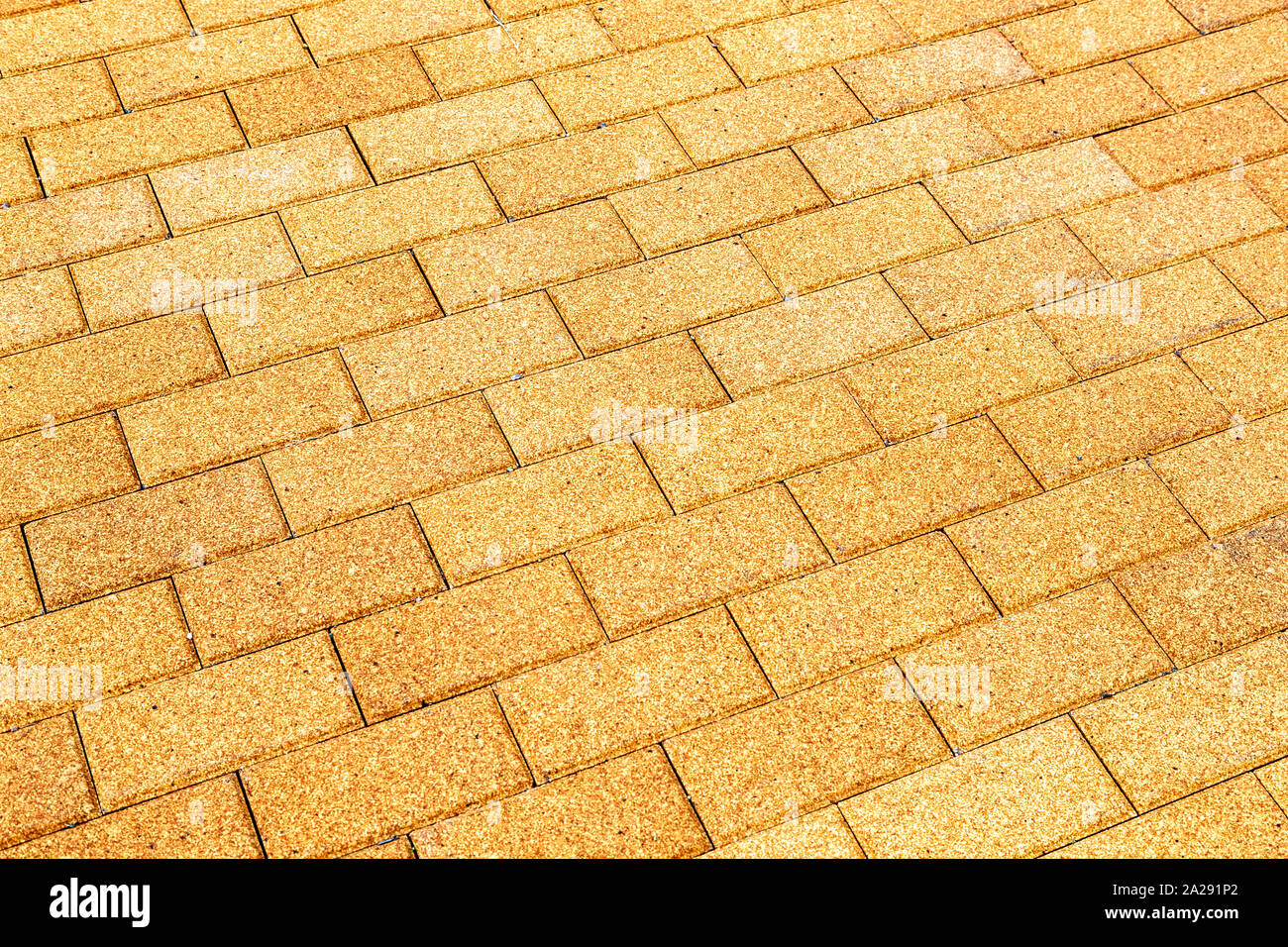 Yellow ceramic paving stones as background texture close up Stock Photo ...