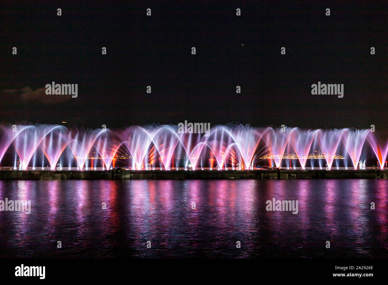 Laser show and water show on the beach of maltepe Stock Photo - Alamy