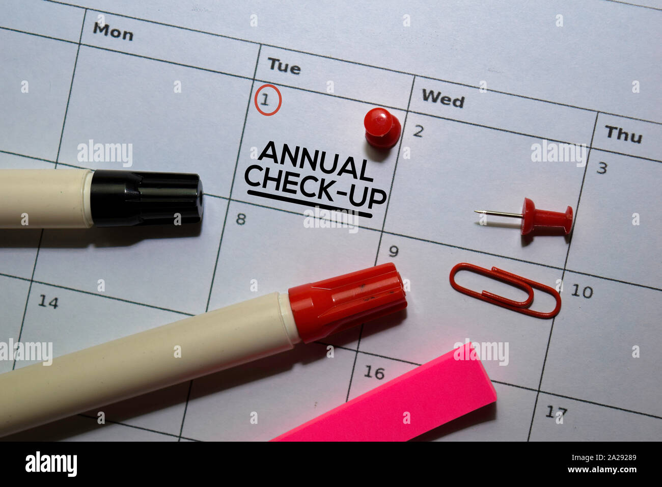 Annual Check-up text on white calendar background. Reminder or schedule ...