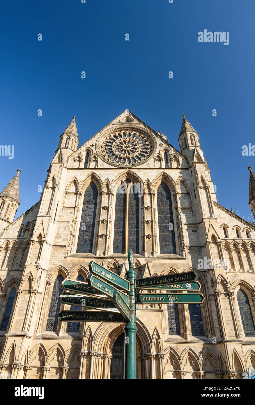 York Minsters famous Rose Window, and a city centre sign post pointing ...