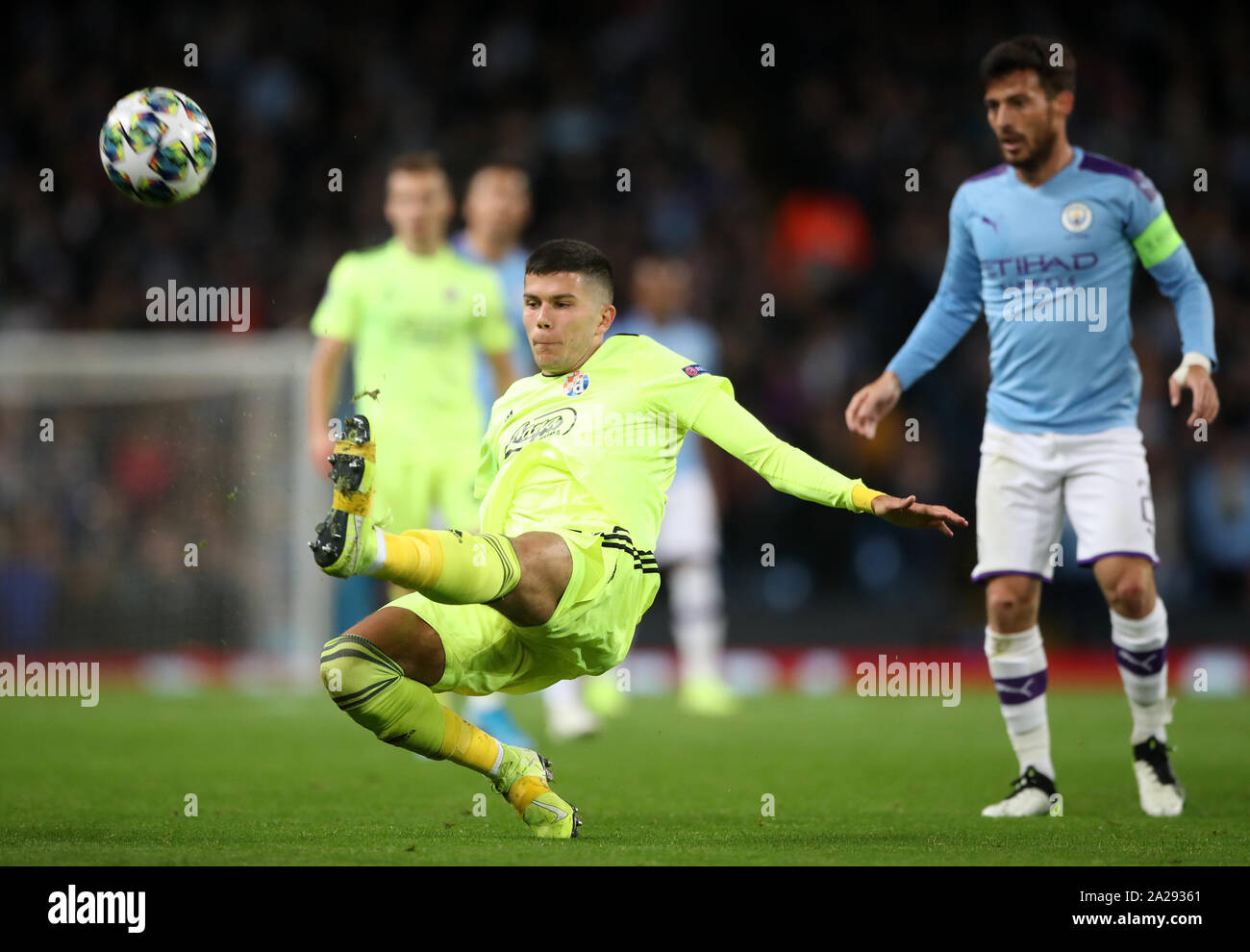 Dinamo Zagreb's Dino Peric clears during the UEFA Champions League ...