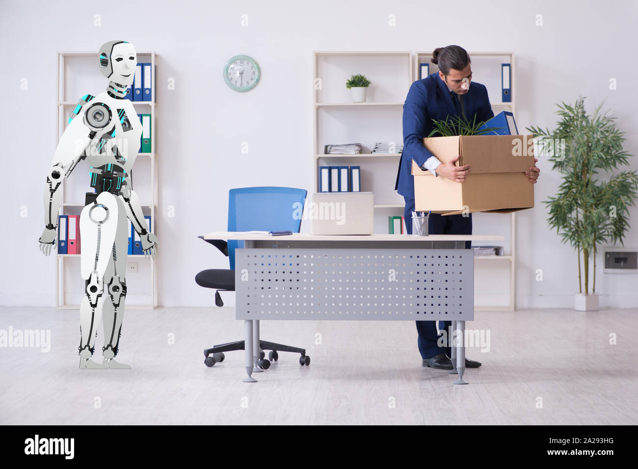 The concept of robots replacing humans in offices Stock Photo - Alamy