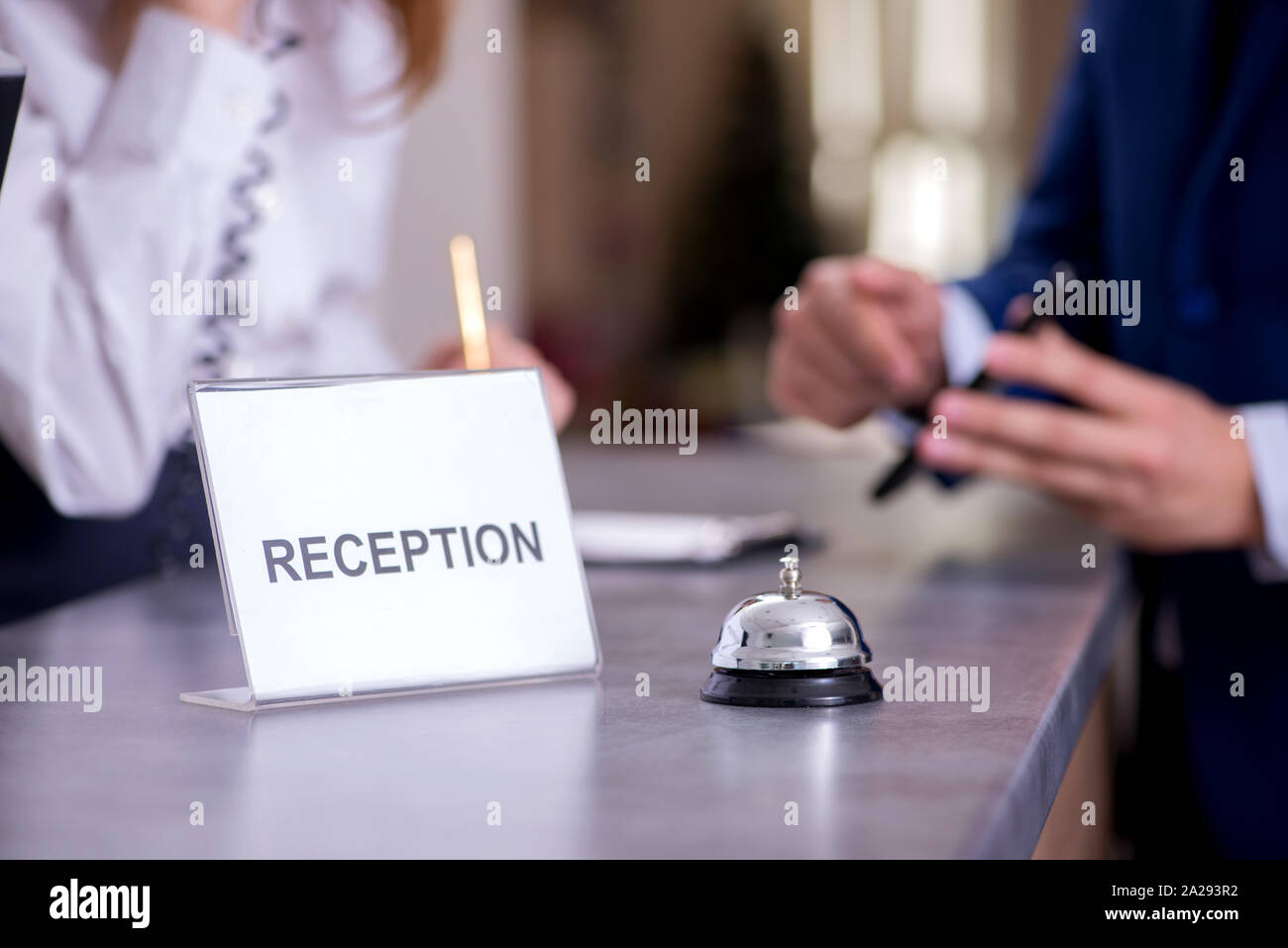 The hotel reception bell at the counter Stock Photo - Alamy