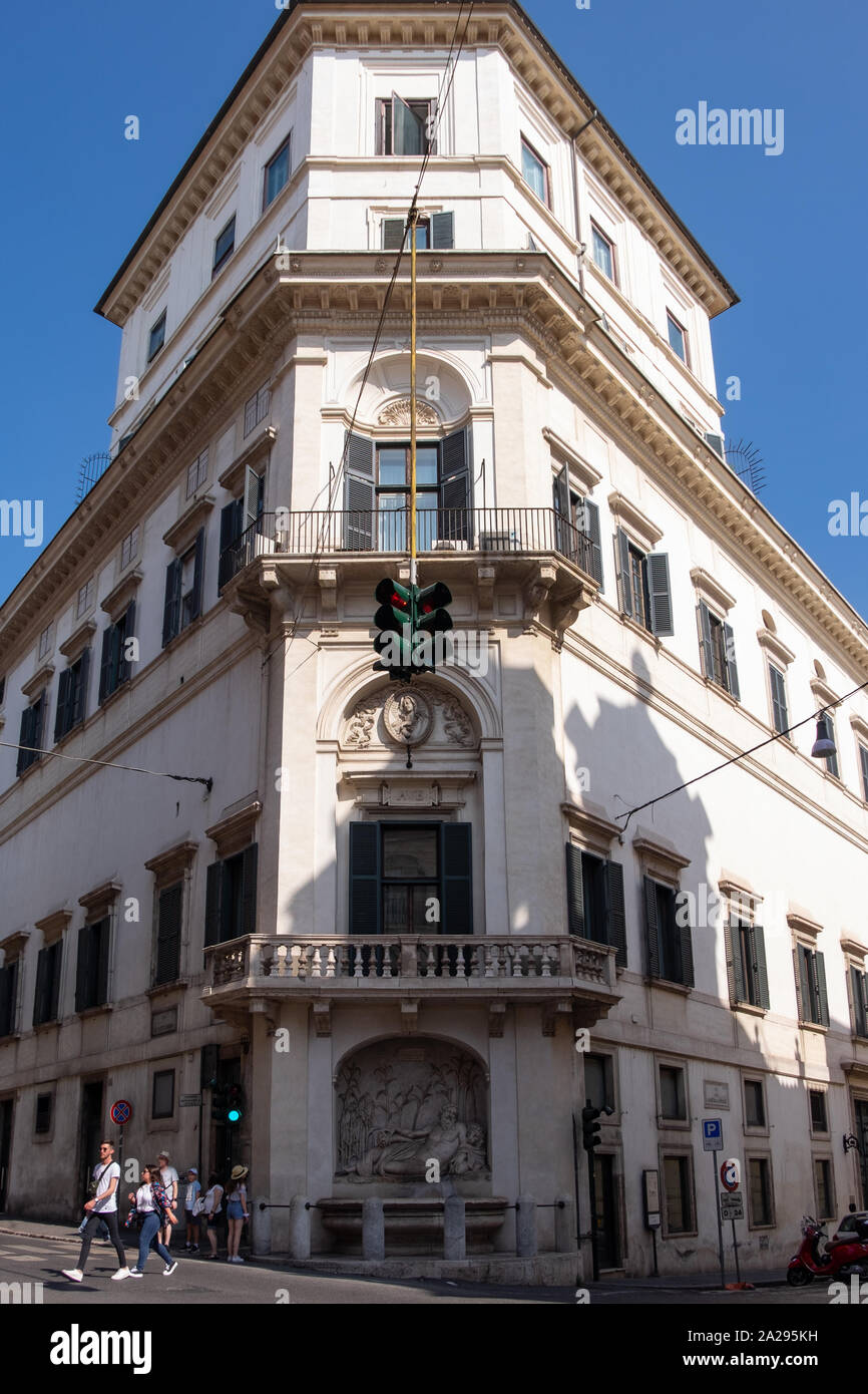 Five storey angular building in white with magnificent sculptures and ...