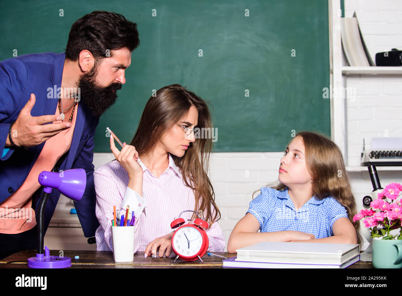 The family school. Family learn together. Little child and parents in ...