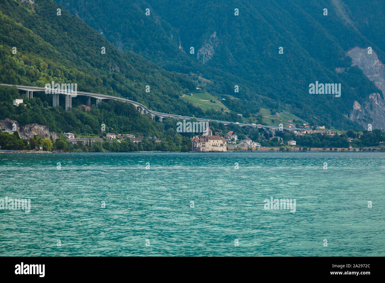 Chillon Castle. mountains and viaduct highway construction on the ...
