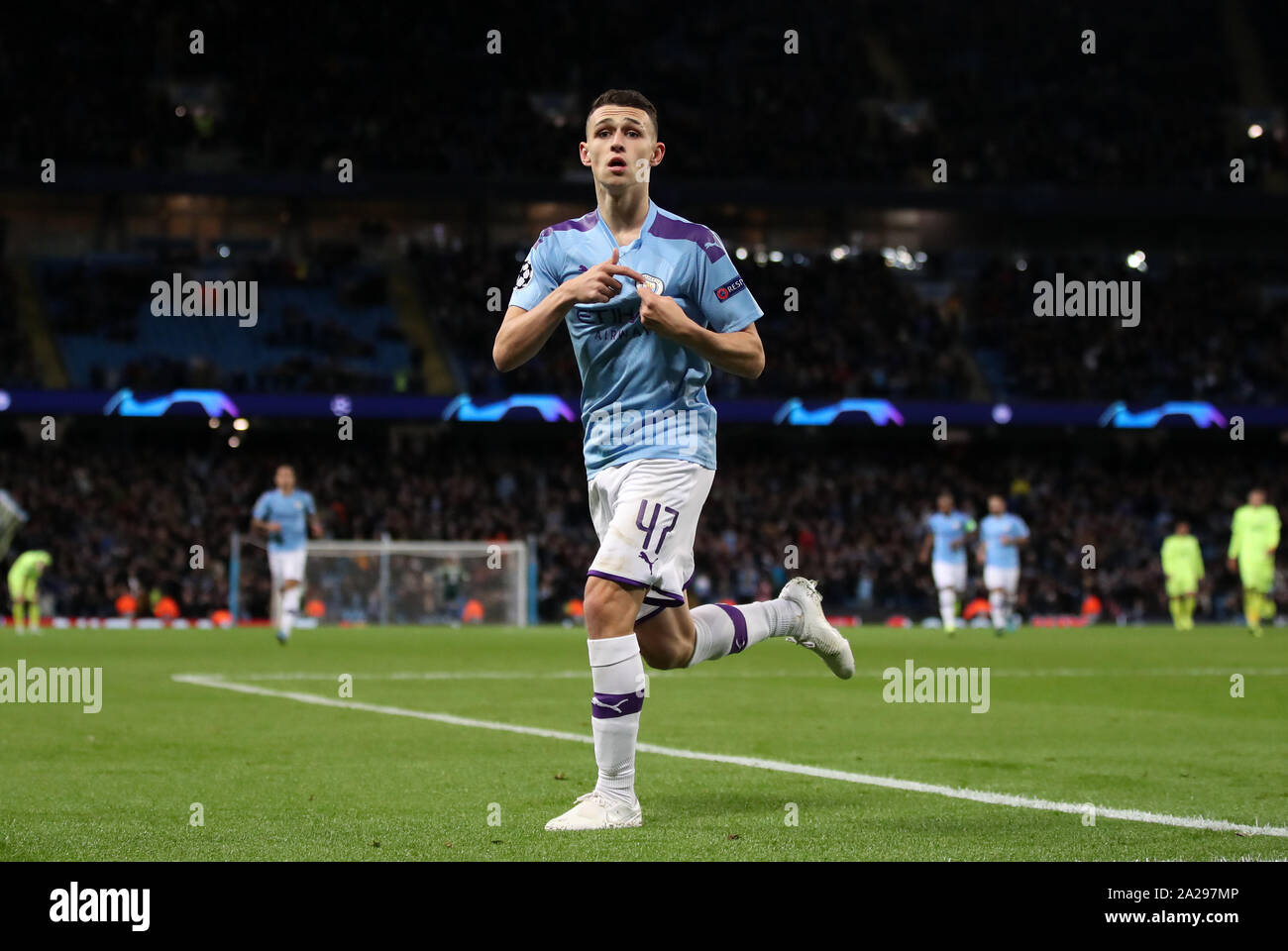 Manchester City's Phil Foden celebrates scoring his side's second goal ...