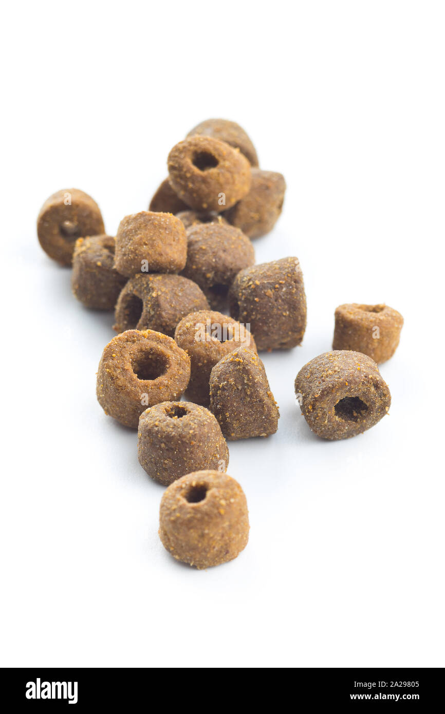 Dry kibble pet food. Kibble for dog or cat isolated on white background ...