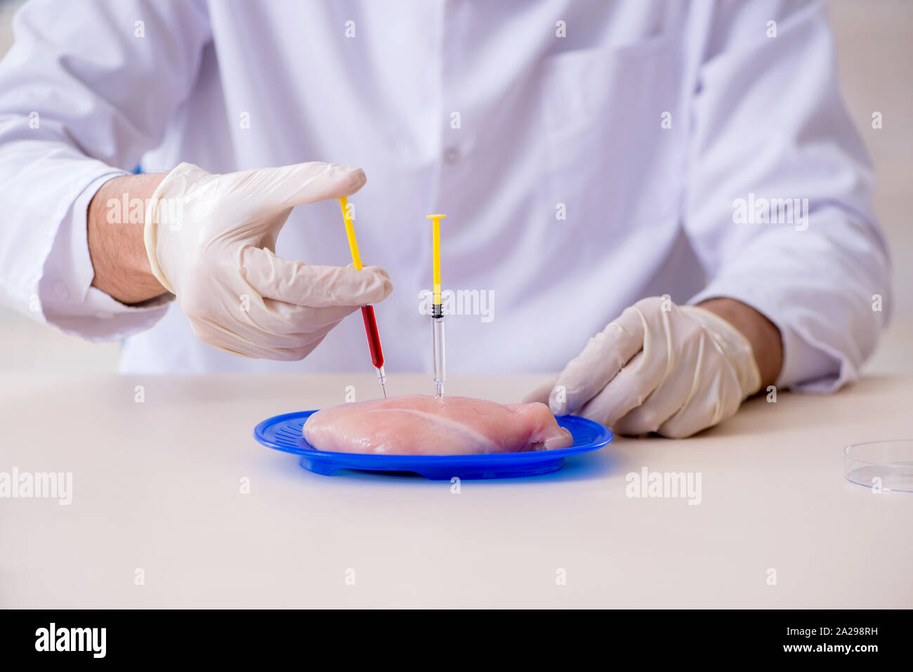 The male nutrition expert testing food products in lab Stock Photo - Alamy