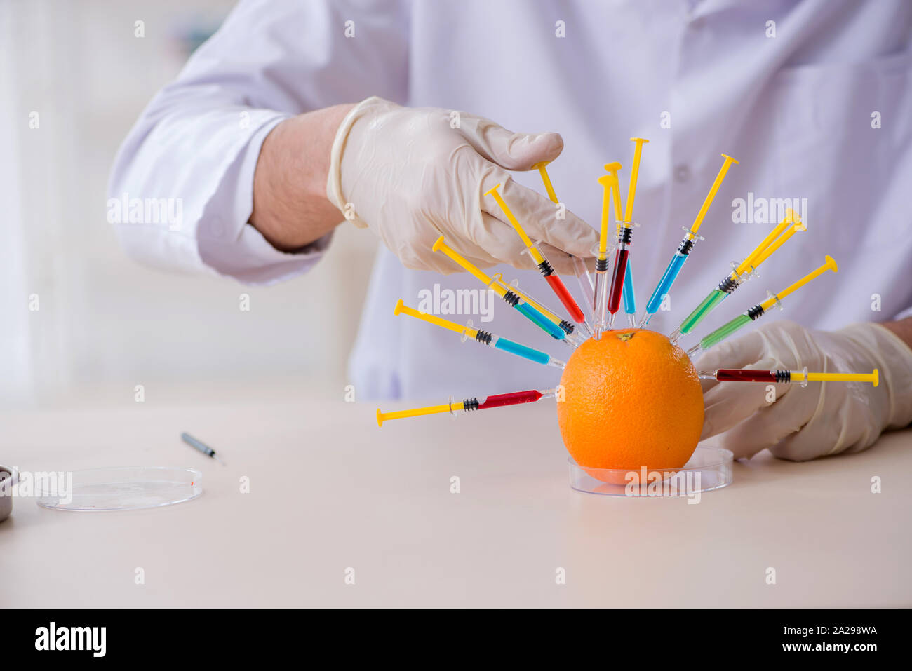 The male nutrition expert testing food products in lab Stock Photo - Alamy