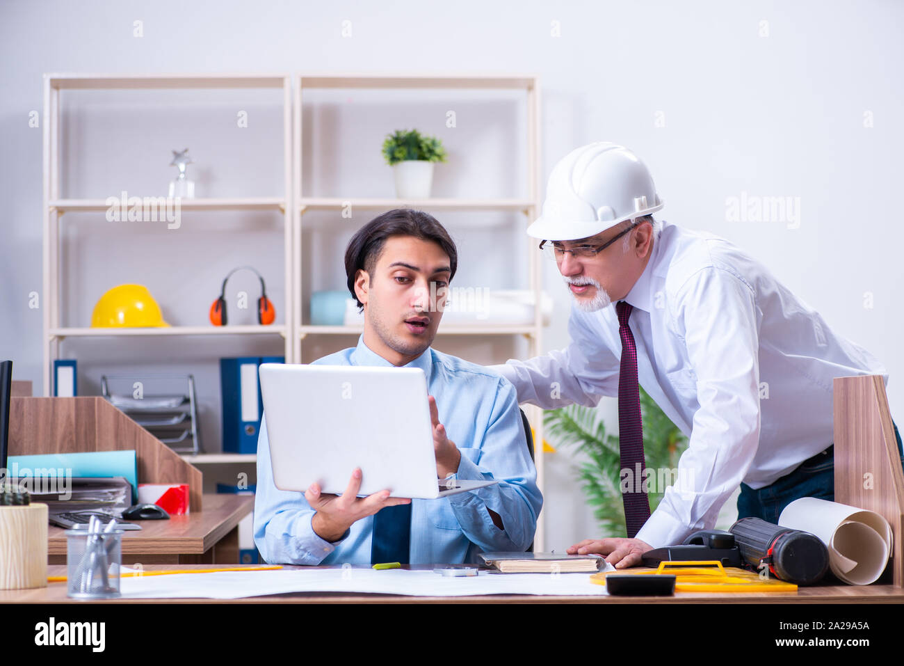 The two architects working on the project Stock Photo - Alamy