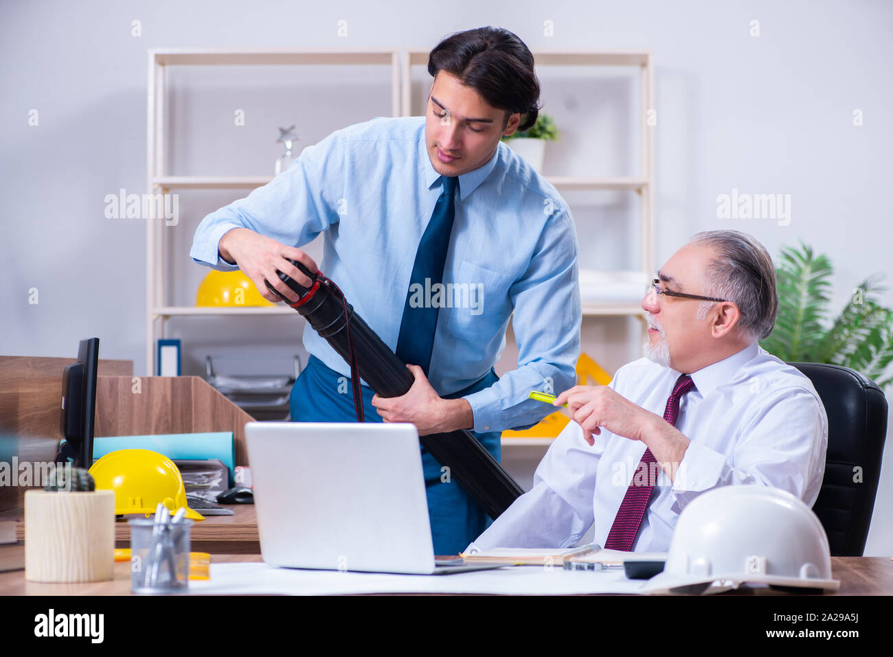 The two architects working on the project Stock Photo - Alamy