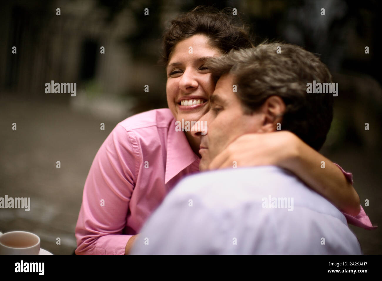 A couple is embracing each other Stock Photo - Alamy