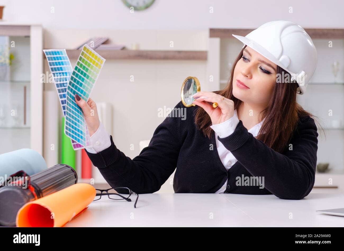 The female designer working in the office Stock Photo - Alamy