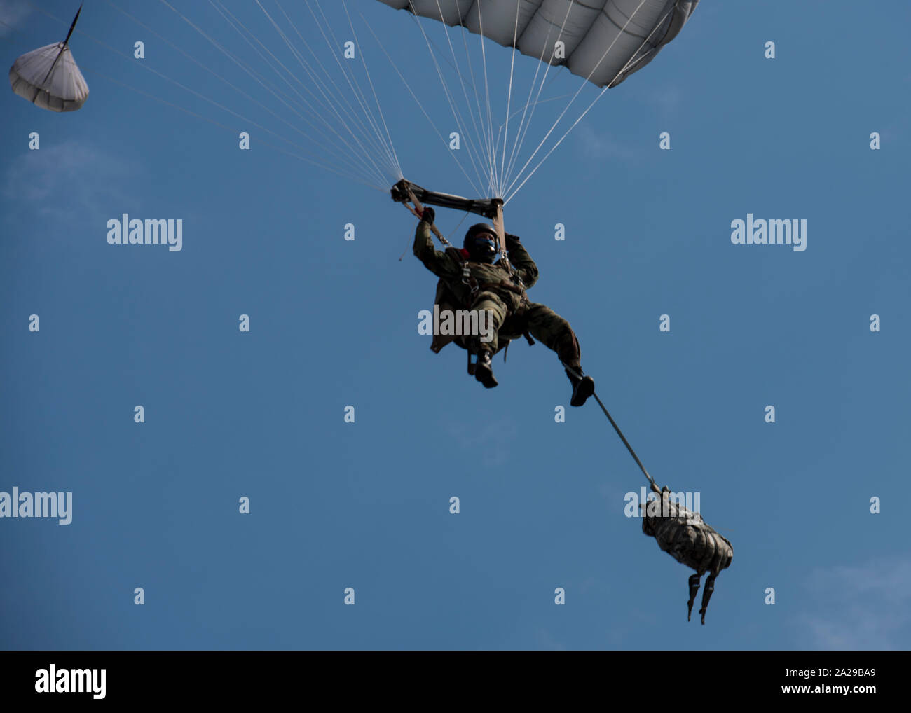A jumper assigned to Bulgaria’s 68th Special Forces Brigade parachutes ...