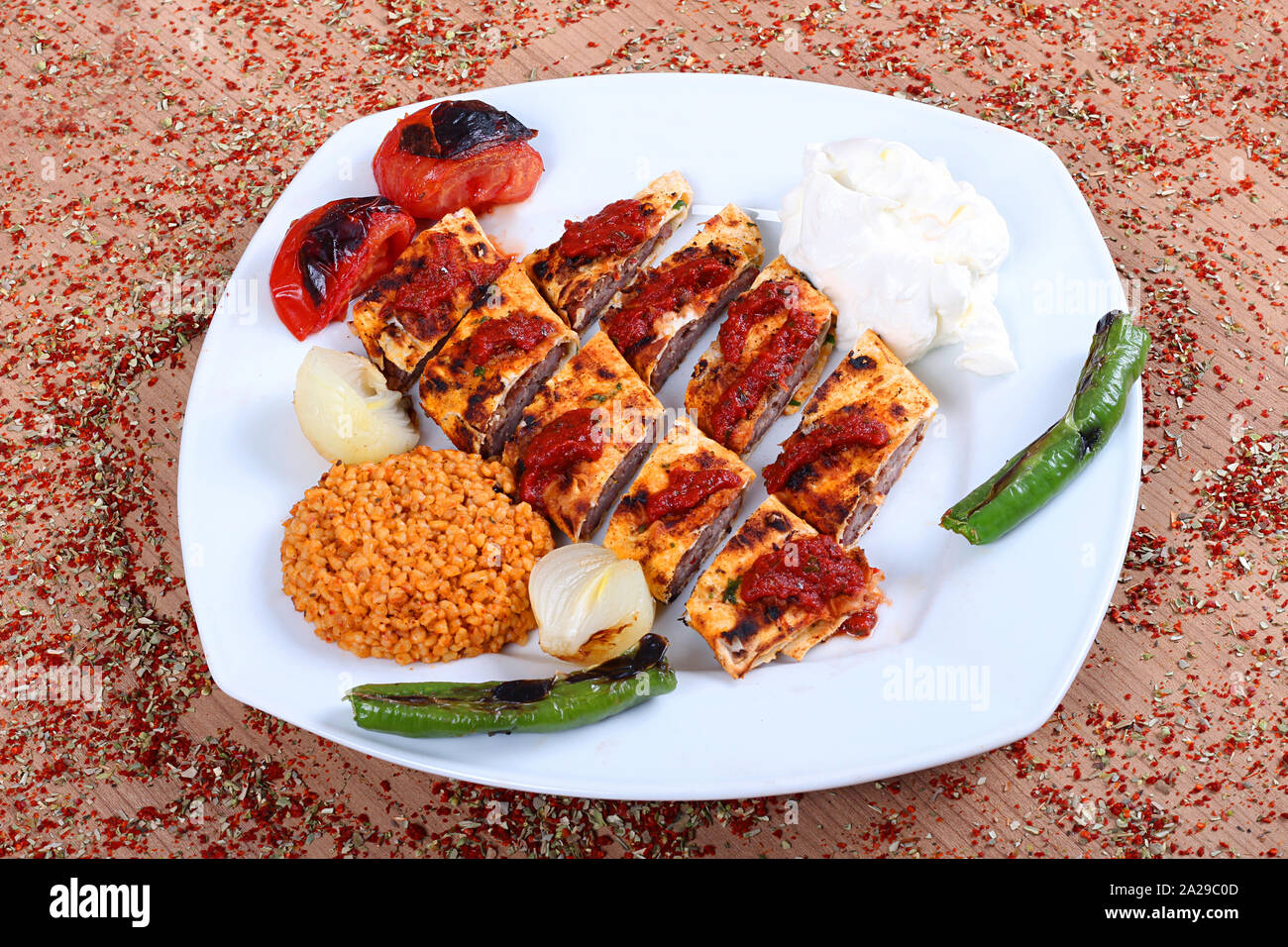 Beef kebab with fresh bread and yogurt and pepper Stock Photo - Alamy