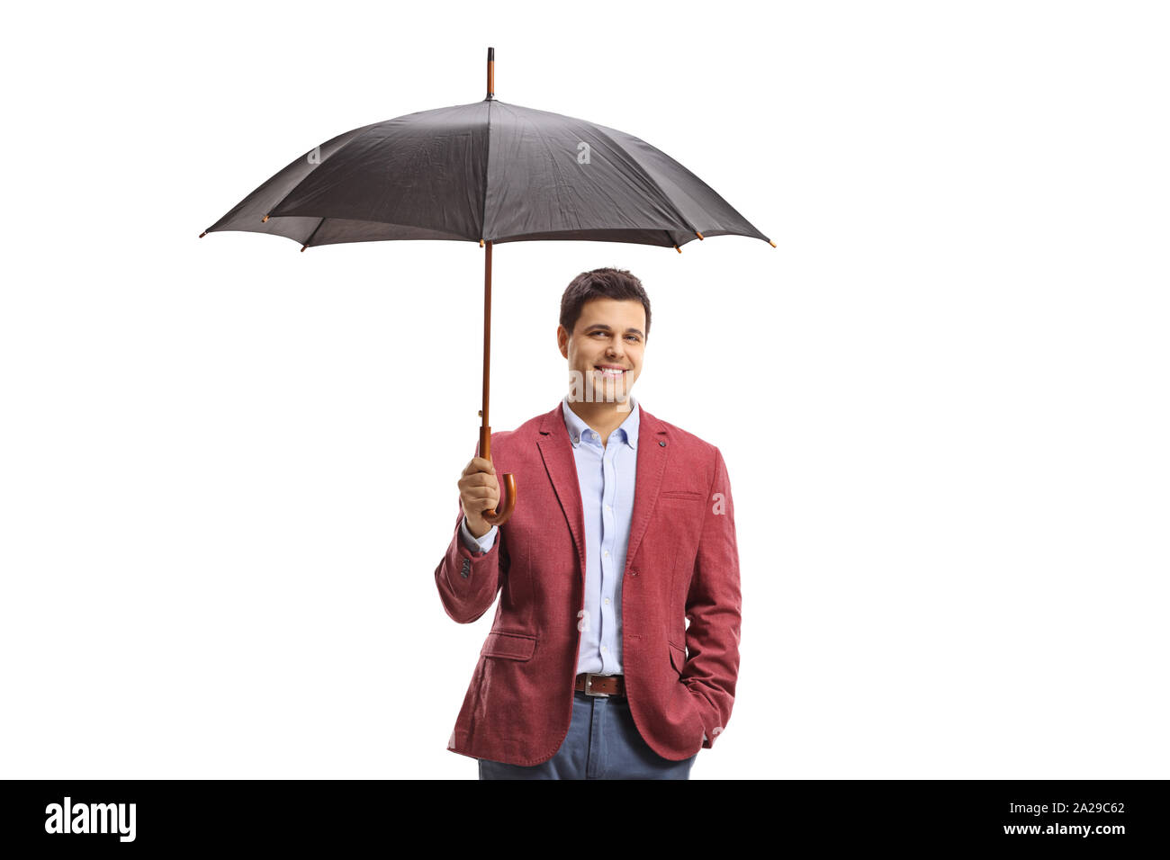 Young man with an umbrella isolated on white background Stock Photo - Alamy