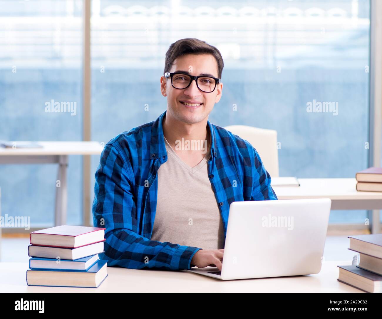 Student in telelearning distance learning concept reading in library ...
