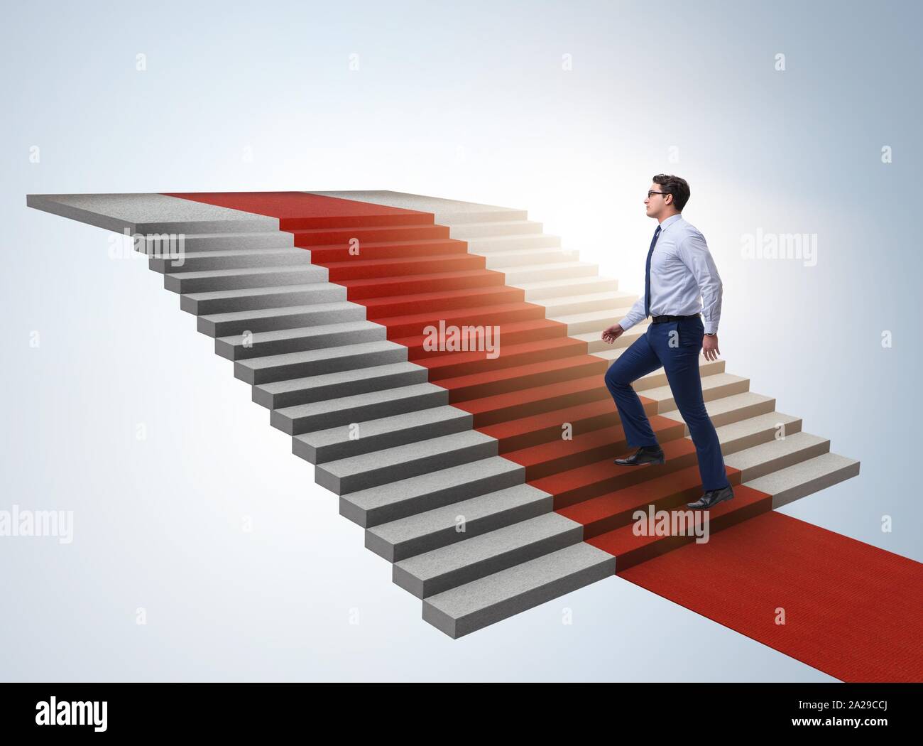 The young businessman climbing stairs and red carpet Stock Photo - Alamy