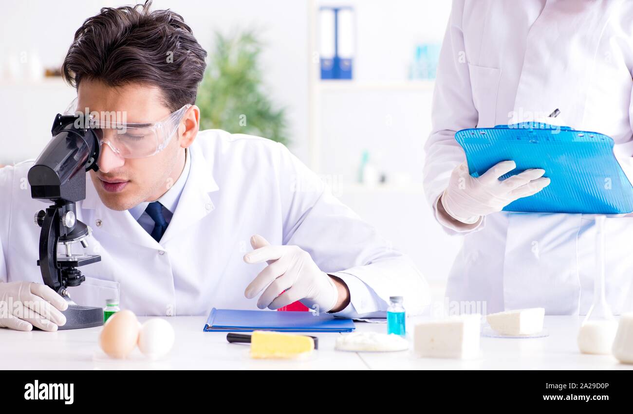 The two lab doctor testing food products Stock Photo - Alamy