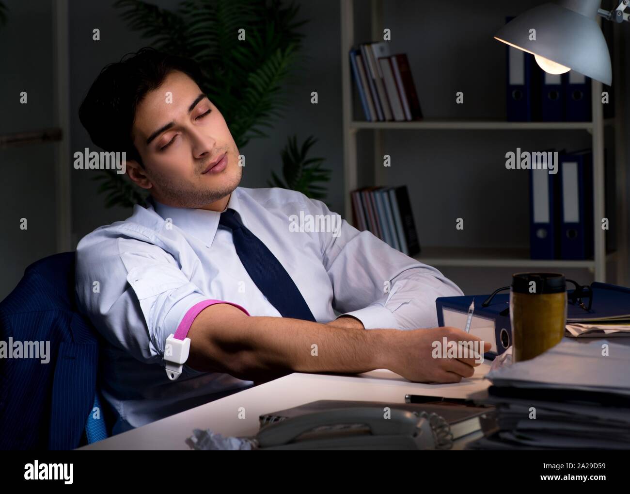 Employee relieving stress from overtime with drugs narcotics Stock ...