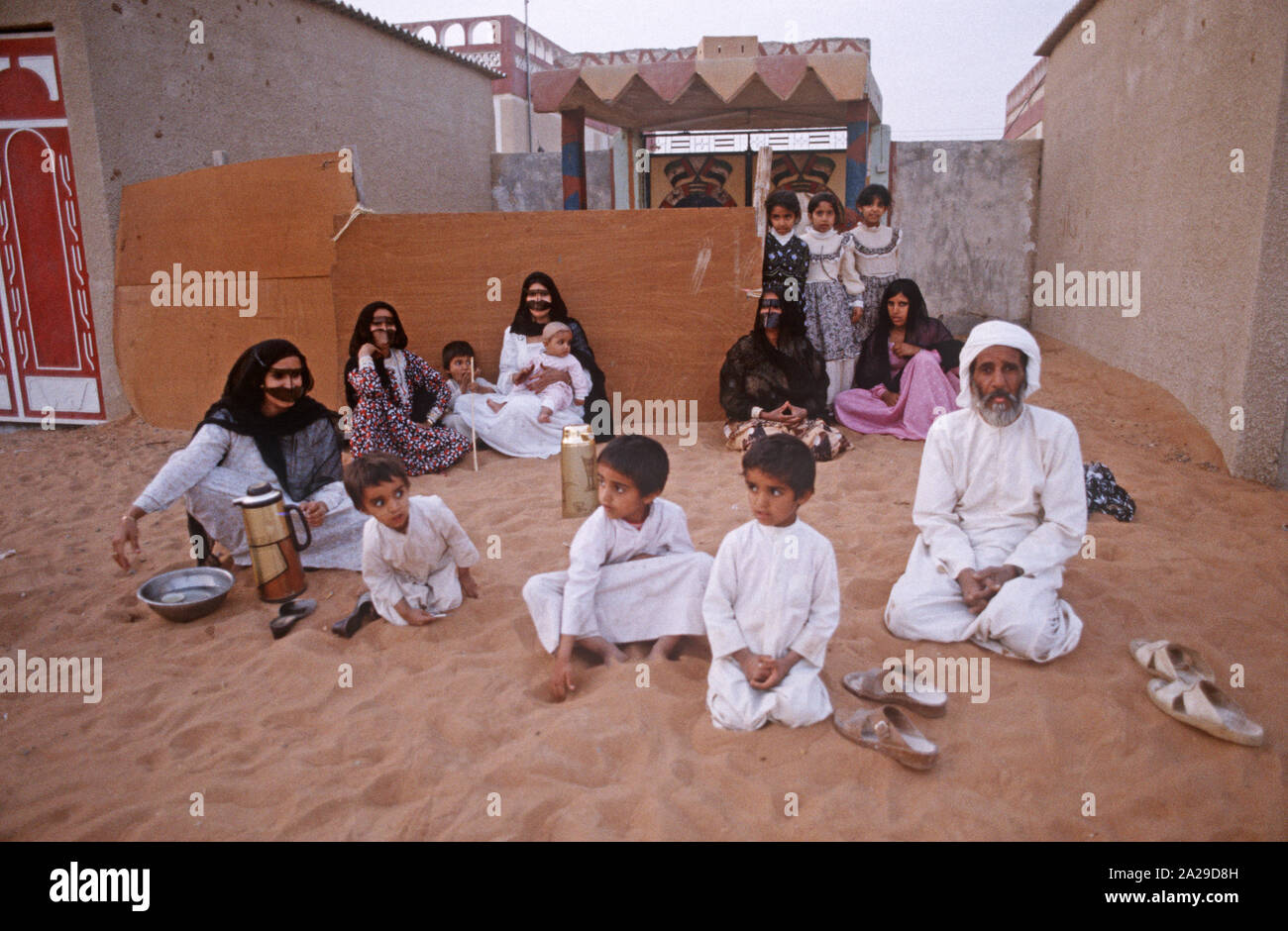 Traditional United Arab Emirate family out side house in Dubai suburb ...