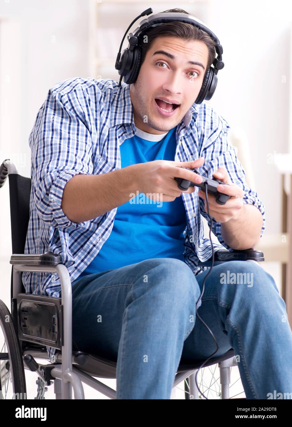 The disabled man playing computer games during rehabilitation Stock ...