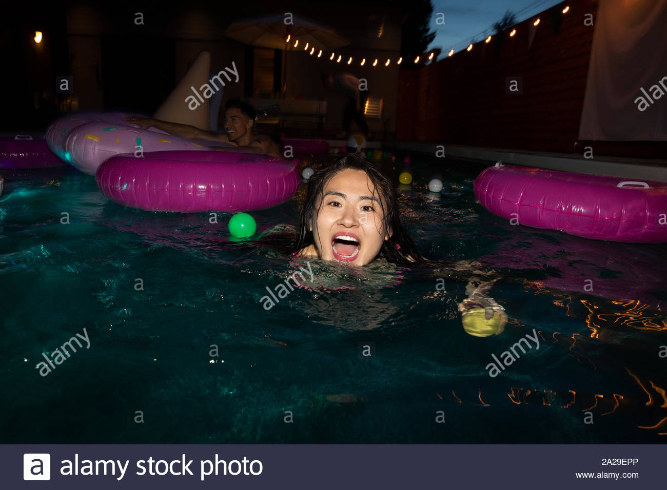 Woman night swimming pool hi-res stock photography and images - Alamy
