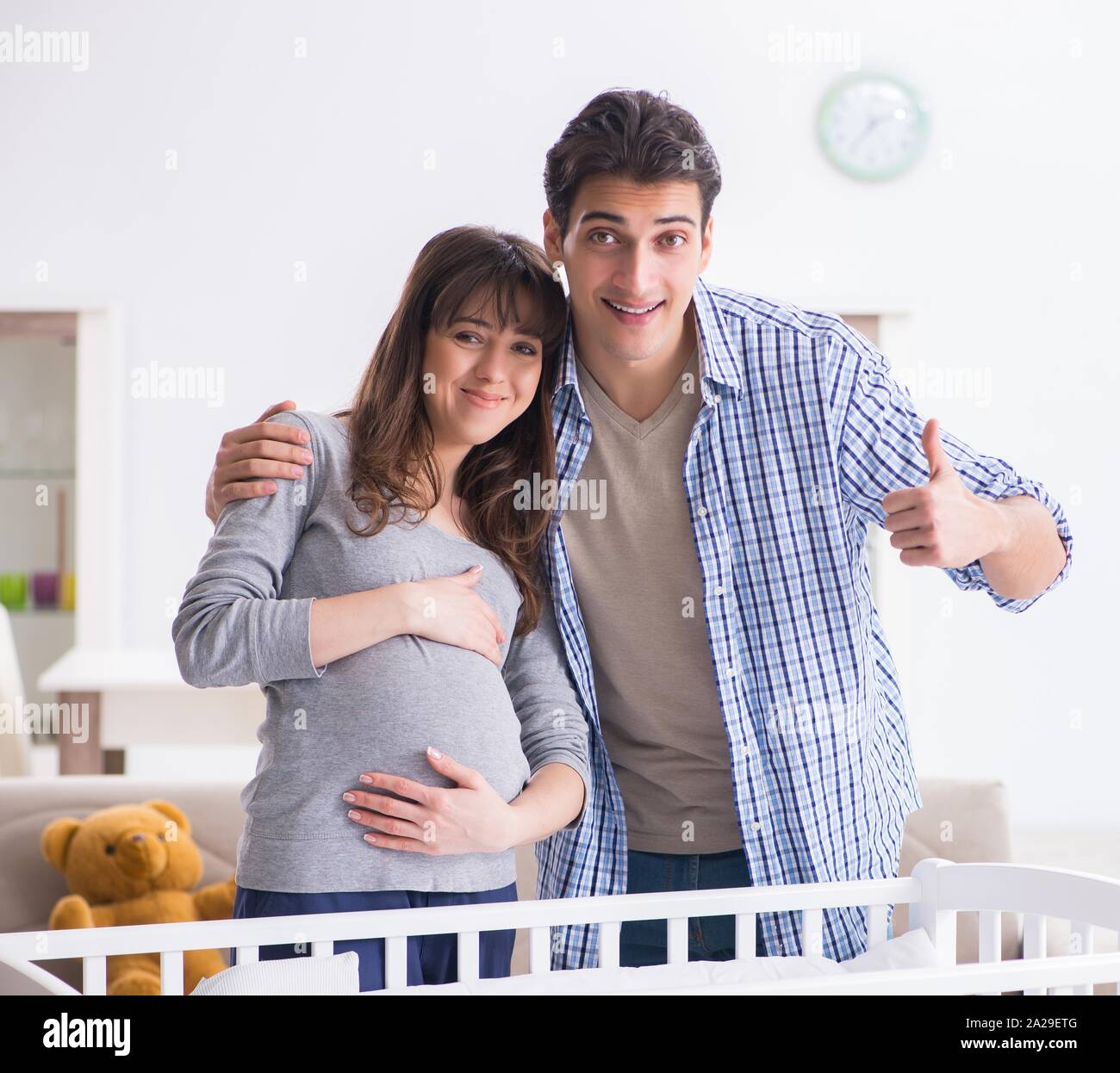 The young parents expecting their first baby Stock Photo - Alamy