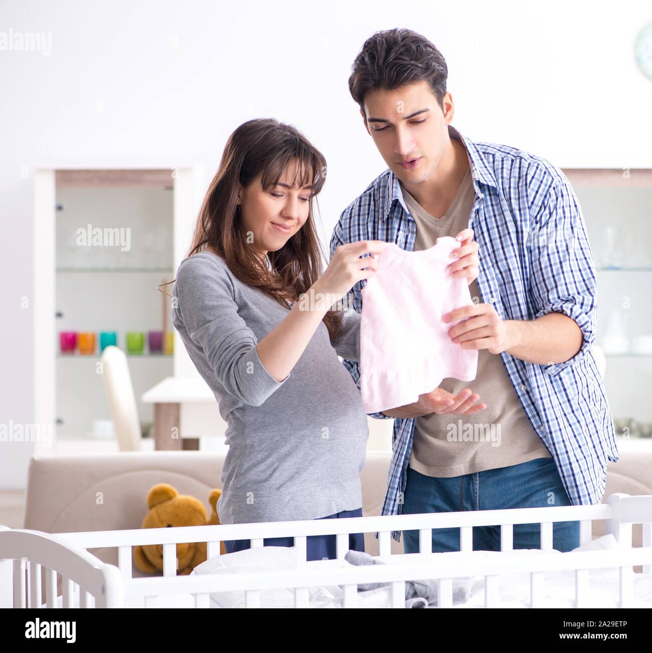 The young parents expecting their first baby Stock Photo - Alamy