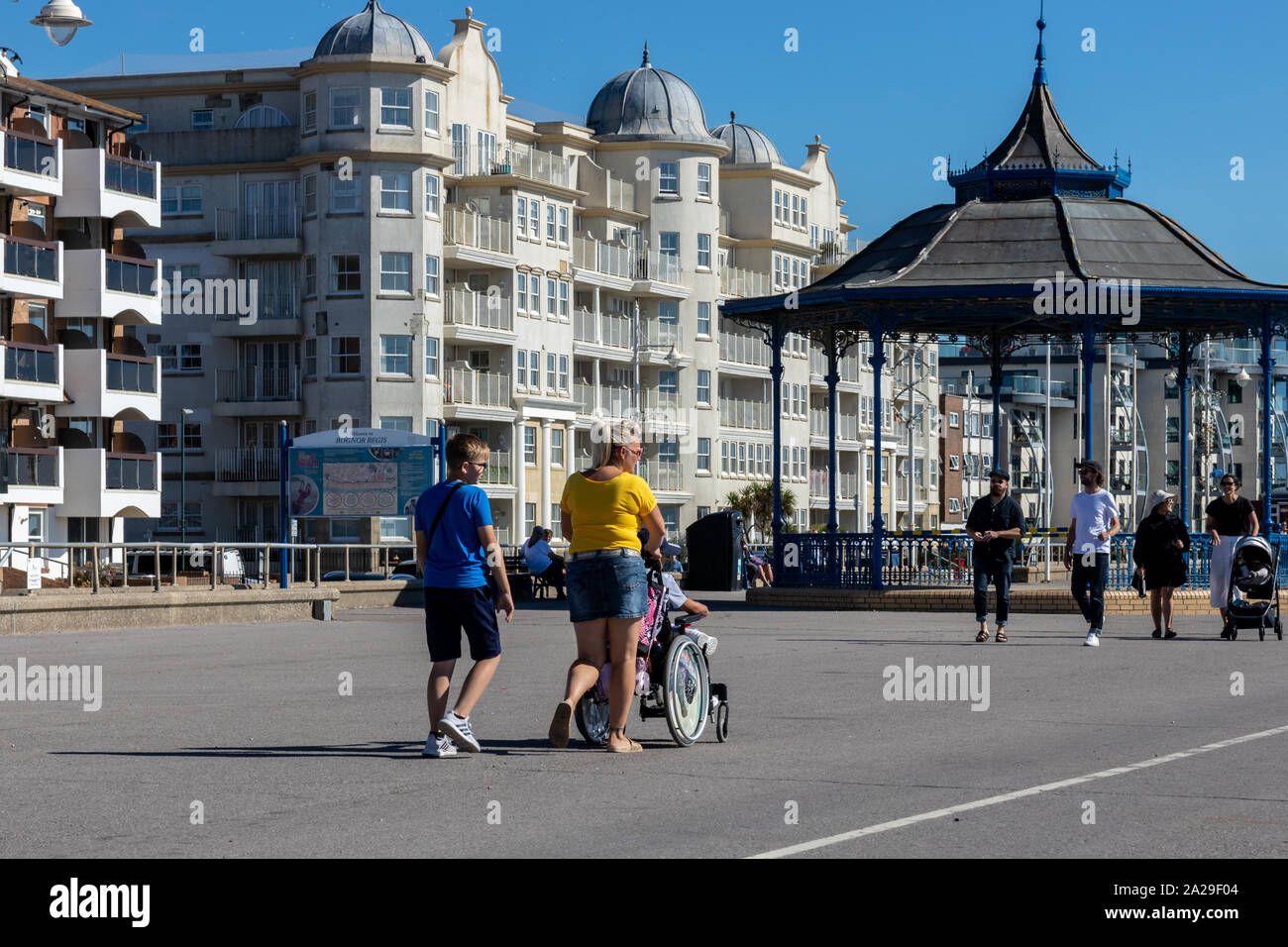 Pushing a stroller along the beach hi-res stock photography and images ...