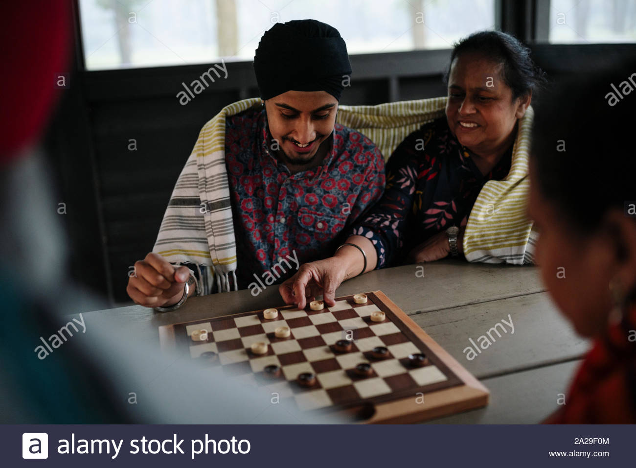 Two girls playing board game hi-res stock photography and images - Alamy